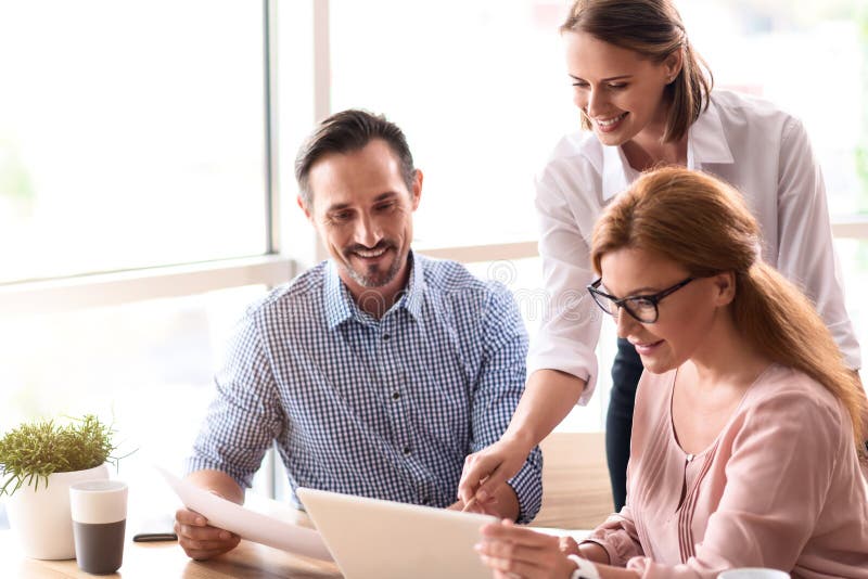 Positive Colleagues Discussing Project Stock Image - Image of modern ...