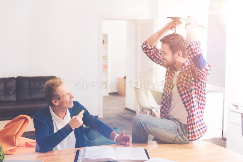 Positive Colleagues Restign in the Office Stock Photo - Image of ...