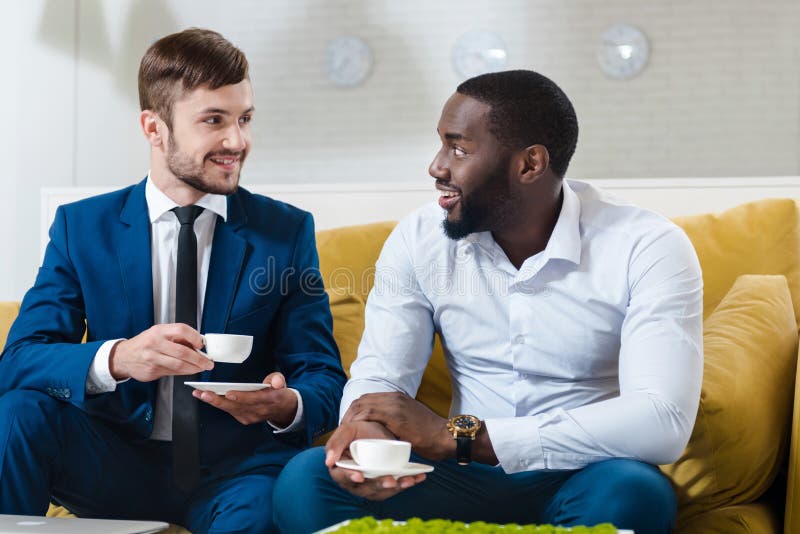 Positive Colleagues Talking Stock Photo - Image of modern, handsome ...