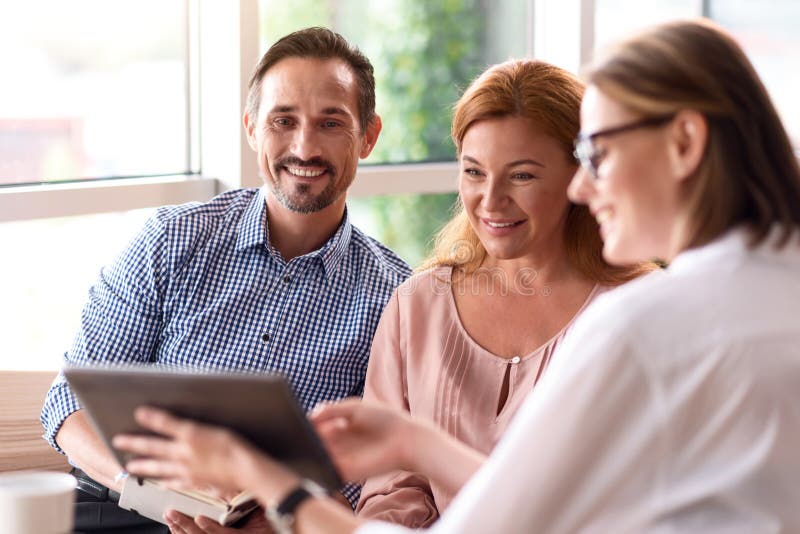 Positive Colleagues Using Tablet Stock Photo - Image of cheerful ...