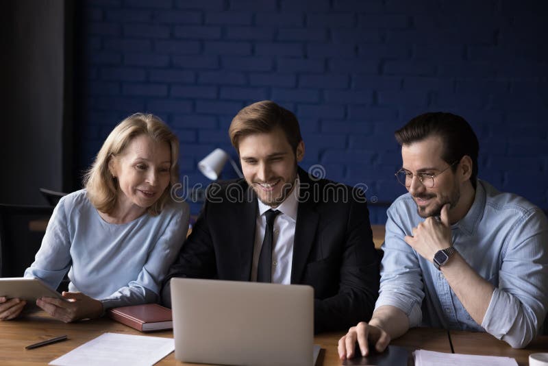 Positive Confident Different Aged Work Group Watching Software Product ...