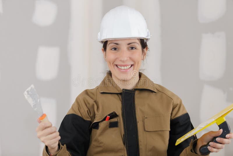 Positive Construction Female Worker with Trowel Stock Image - Image of ...