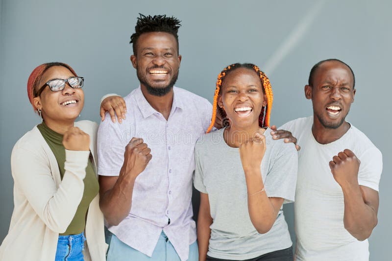 Positive Corporate Team Posing while Looking at the Camera Stock Photo ...