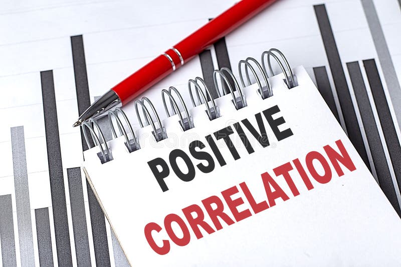 POSITIVE CORRELATION Text Written on Notebook with Pen on Chart Stock ...