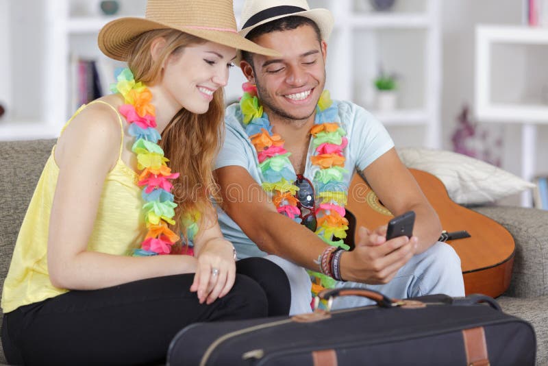 Positive Couple with Luggage in Home Going on Holiday Stock Photo ...