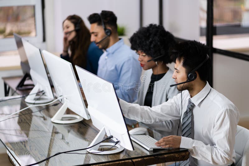 Positive Customer Services Agent with Headset Working Stock Photo ...