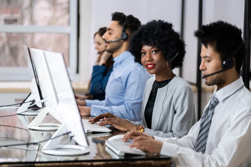Positive Customer Services Agent with Headset Working Stock Image ...