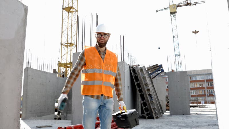 Positive Dance of Builders in Helmet. Construction Engineer in Builder ...