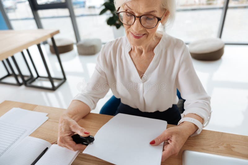 Positive Delighted Woman Holding a Stapler Stock Photo - Image of ...