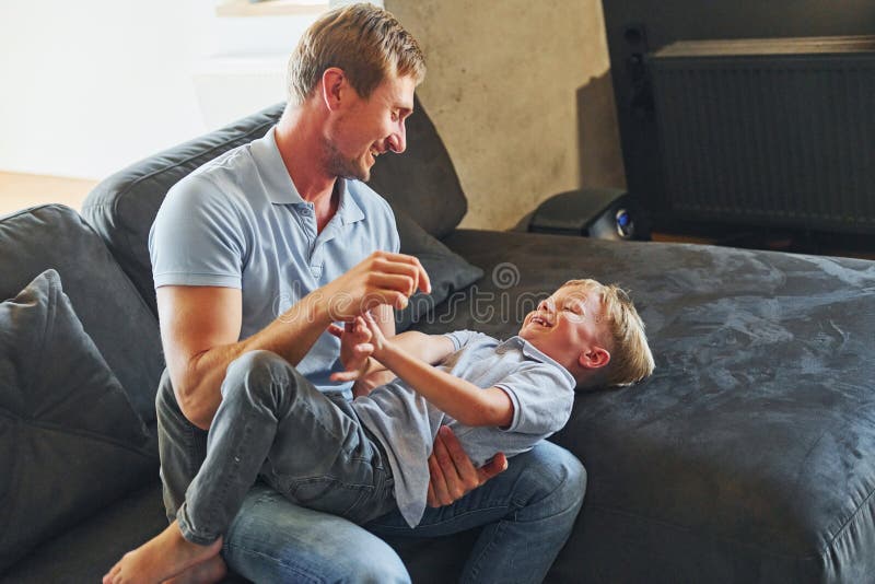 Positive Emotions. Father and Son is Indoors at Home Together Stock ...