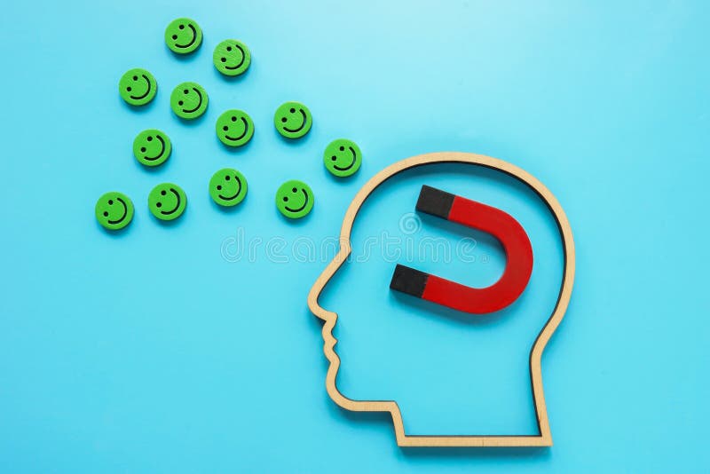 Positive Emotions and Thinking. a Head with a Magnet Attracts Happy ...