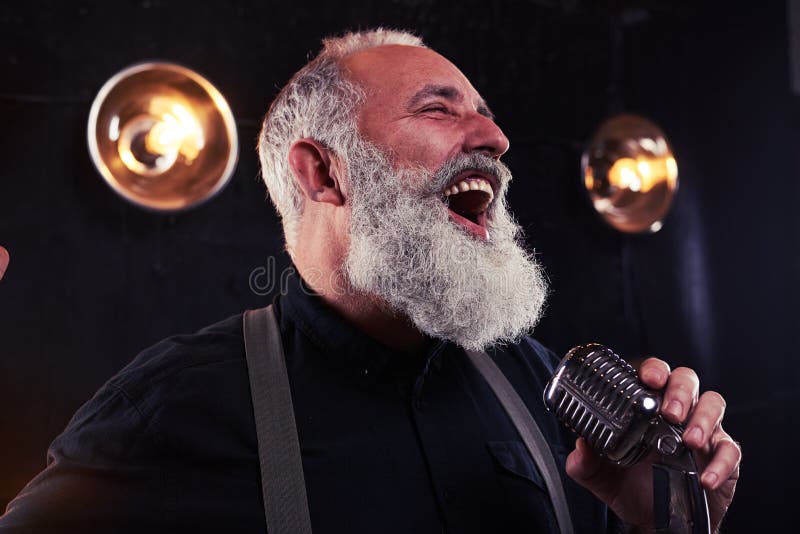 Positive Engaging Man Demonstrating Solo Performance and Posing Stock ...