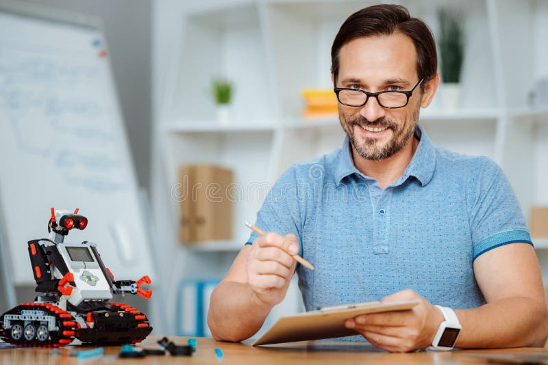 Positive Engineer Working in a Lab Stock Image - Image of artificial ...