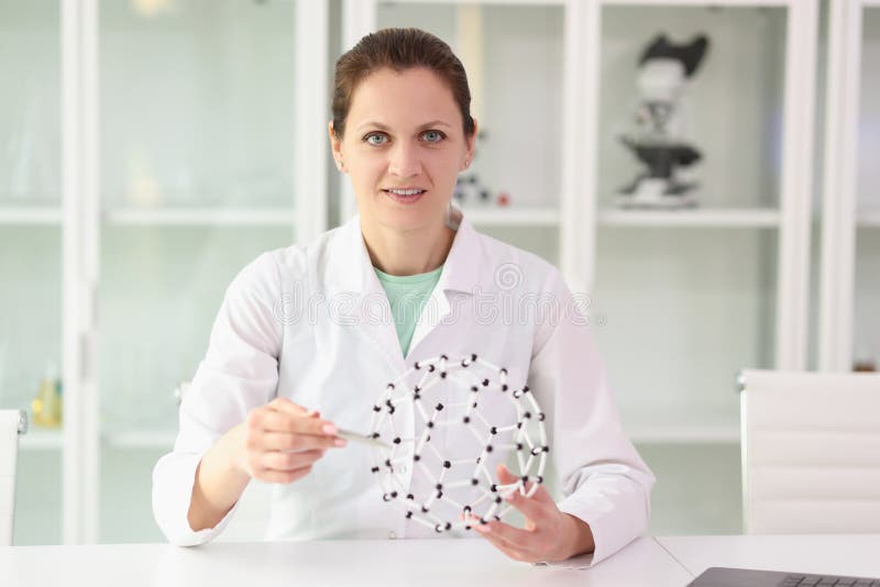 Positive Female Chemist Points Pen To Molecule Model Stock Image ... Positive Female Chemist Points Pen To Molecule Model Stock Image ...