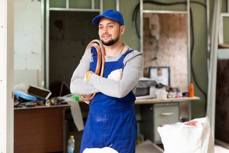 Positive Foreman Posing on Indoor Construction Site Stock Image - Image ...