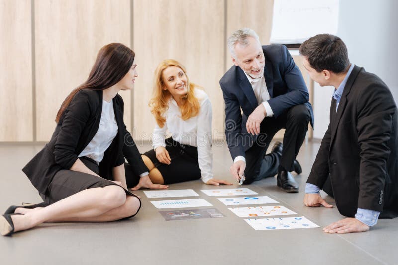 Positive Friendly Colleagues Having a Discussion Stock Photo - Image of ...