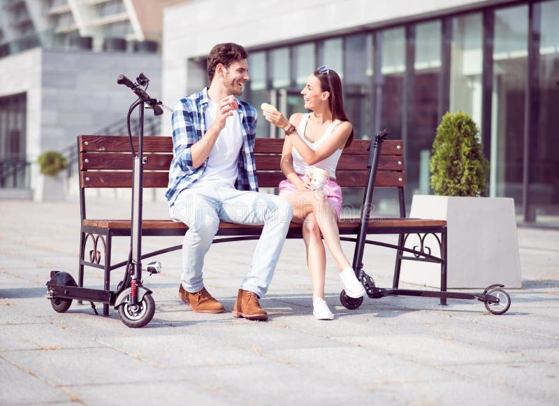Positive Friends Resting on the Bench Stock Photo - Image of ...