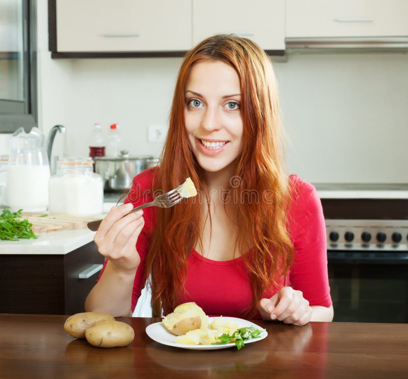Positive Girl Eating Jacket Potatoes Stock Photo - Image of food ...