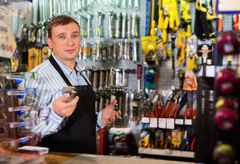 Positive Seller Standing in Hardware Shop Stock Image - Image of ...