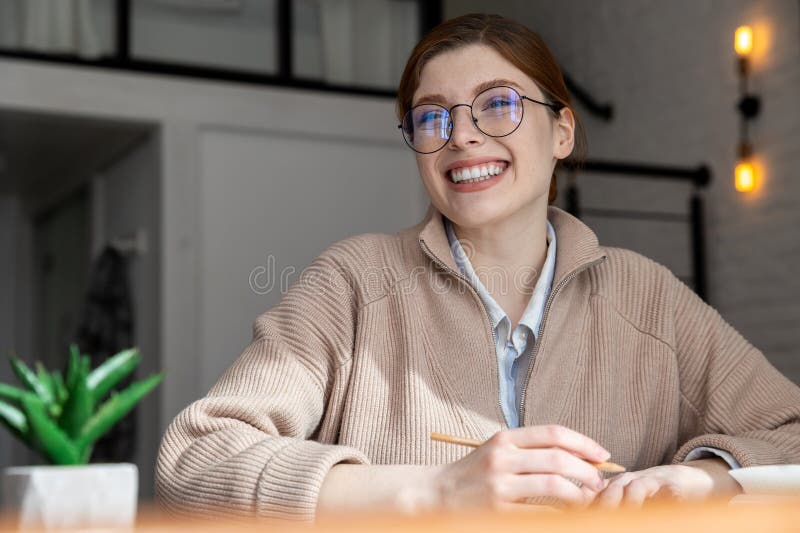 Positive Good-looking Young Woman Working on the Project Stock Photo ...