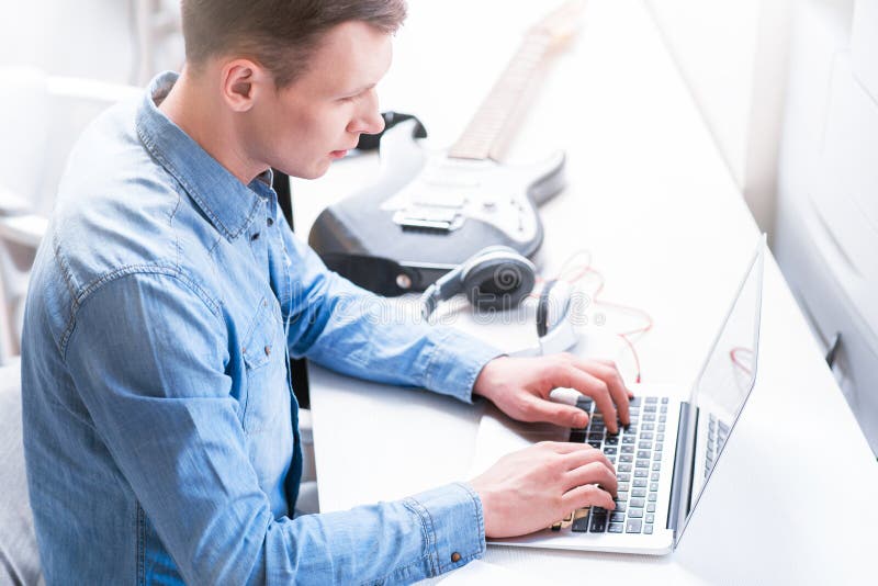 Positive guy typing stock photo. Image of device, digital - 68833372