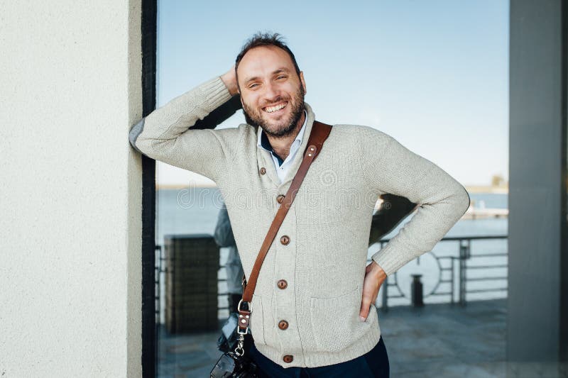 Positive Happy Man Smiling at the Wall and Glass Stock Photo - Image of ...