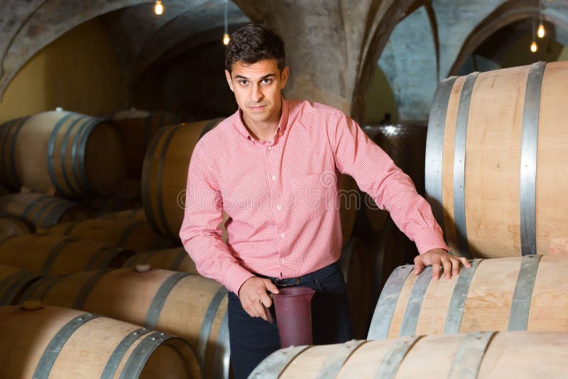 Positive Male Owner of Winery Standing with Wine Stock Image - Image of ...