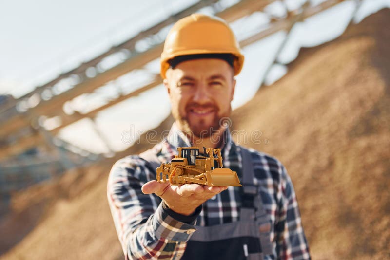 Positive Man. Construction Worker in Uniform is on the Quarry Stock ...