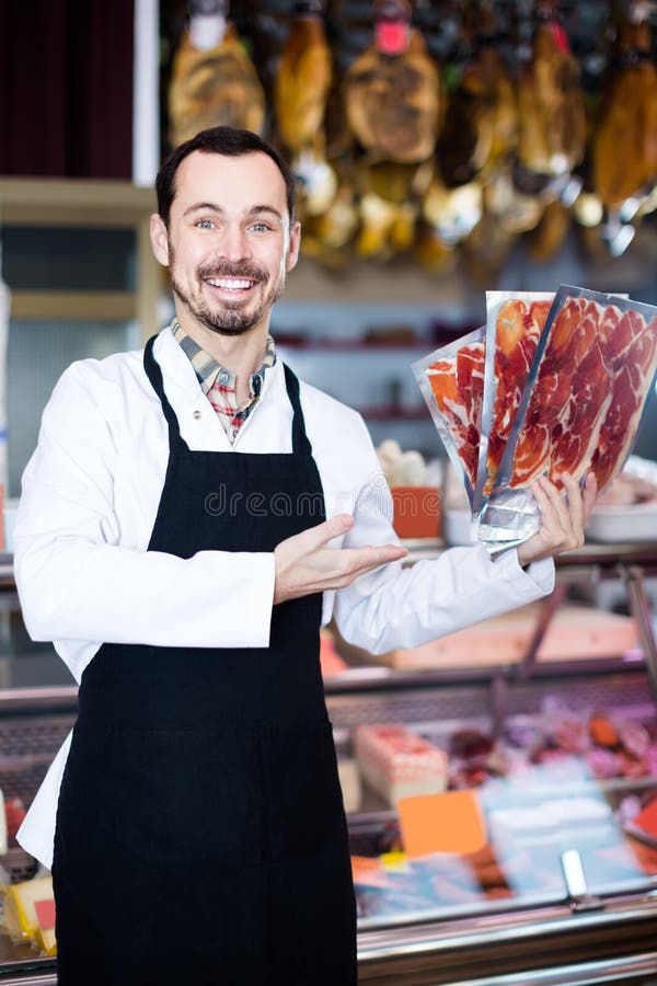Positive Man Seller Showing Sliced Bacon in Shop Stock Photo - Image of ... Positive Man Seller Showing Sliced Bacon in Shop Stock Photo - Image of ...