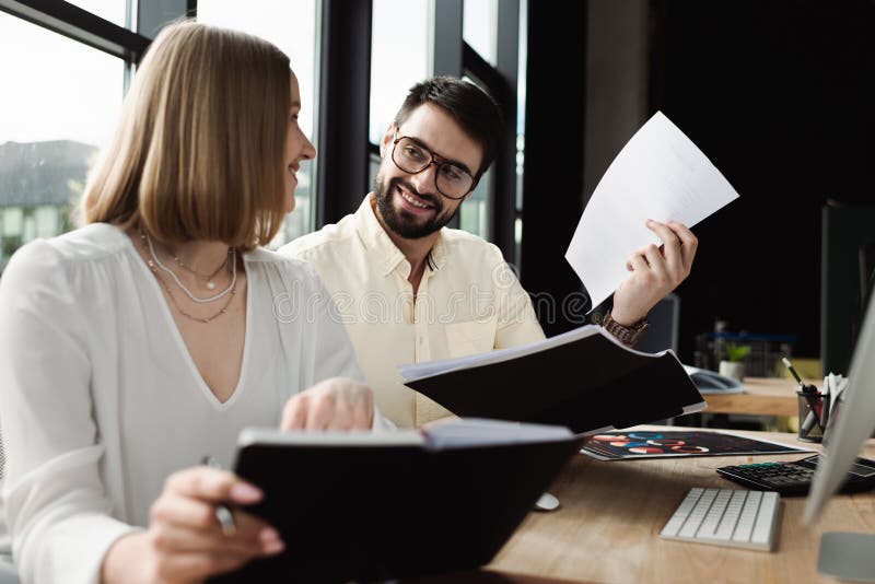 Positive Manager Holding Paper Folder and Stock Image - Image of people ...