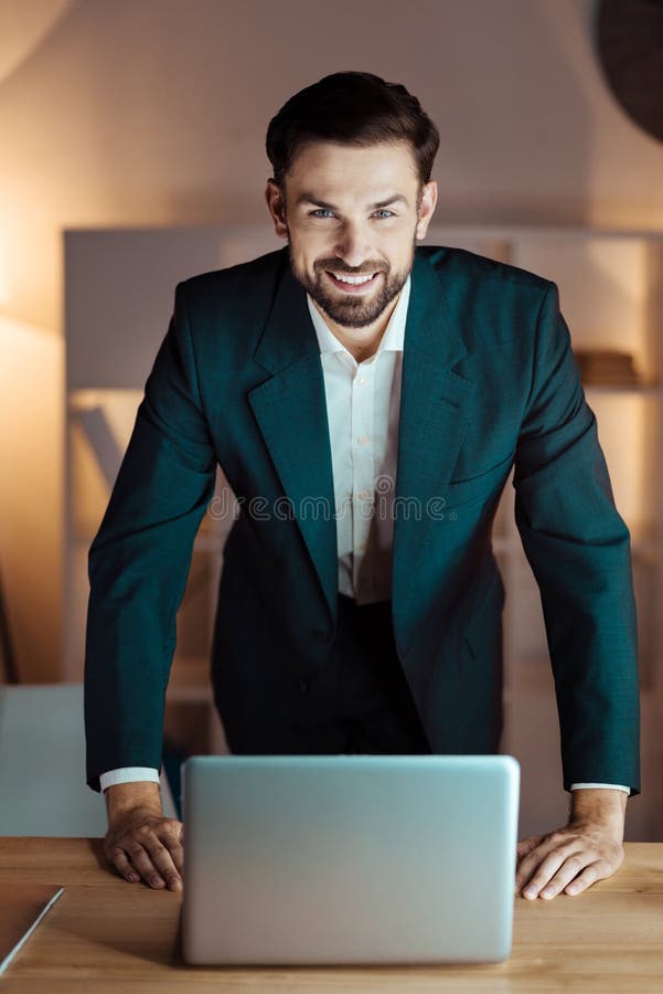 Positive Manager Standing in Front of His Computer Stock Photo - Image ...