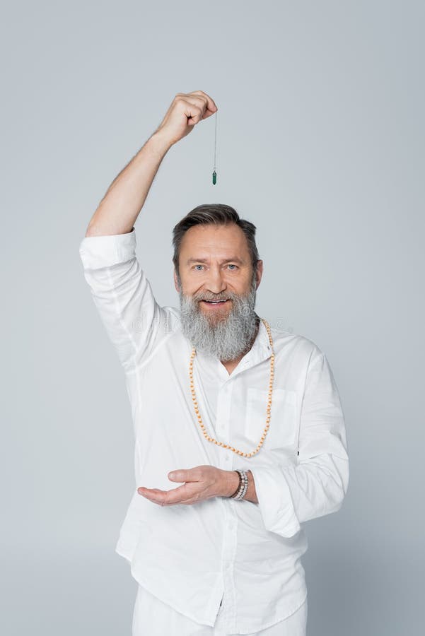 Positive Master Guru with Dowsing Pendulum Stock Photo - Image of shirt ...