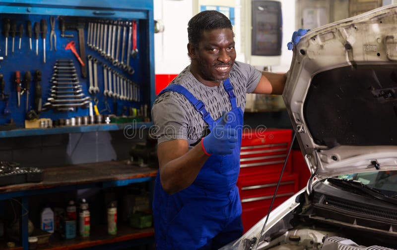 Positive Mechanic Makes Sign that Everything is Fine Stock Image ...