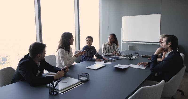 Positive Multiethnic Team Colleagues Brainstorming in Office Boardroom Stock Footage - Video of ...