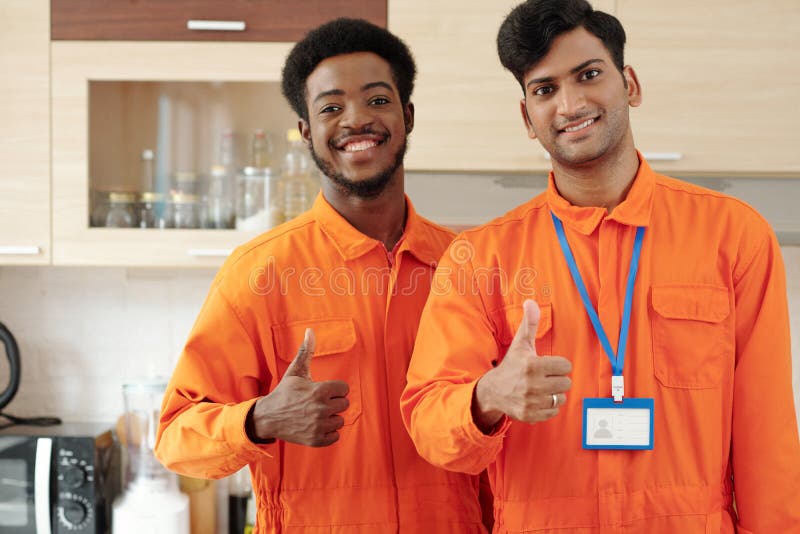 Positive Plumbers Showing Thumbs-up Stock Photo - Image of apartment ...