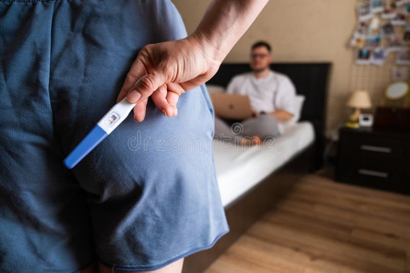 Positive Pregnancy Test Hidden Behind Back Stock Image - Image of ...