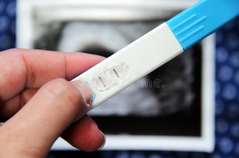 Positive Pregnancy Test with Two Stripes Stock Image - Image of ...