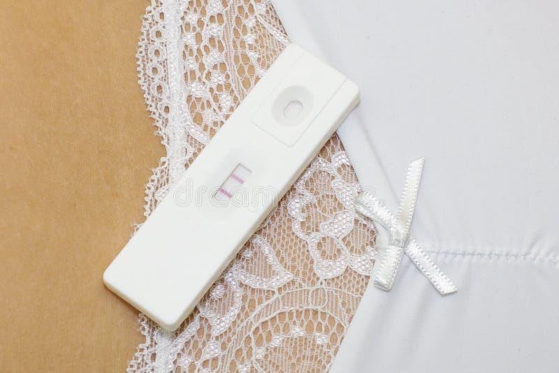 Positive Pregnancy Test on the Woman Belly Stock Photo - Image of ...
