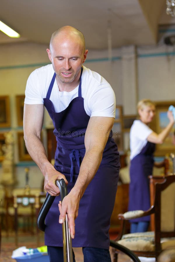 Positive Professional Cleaners Team with Equipment Working at Client ...