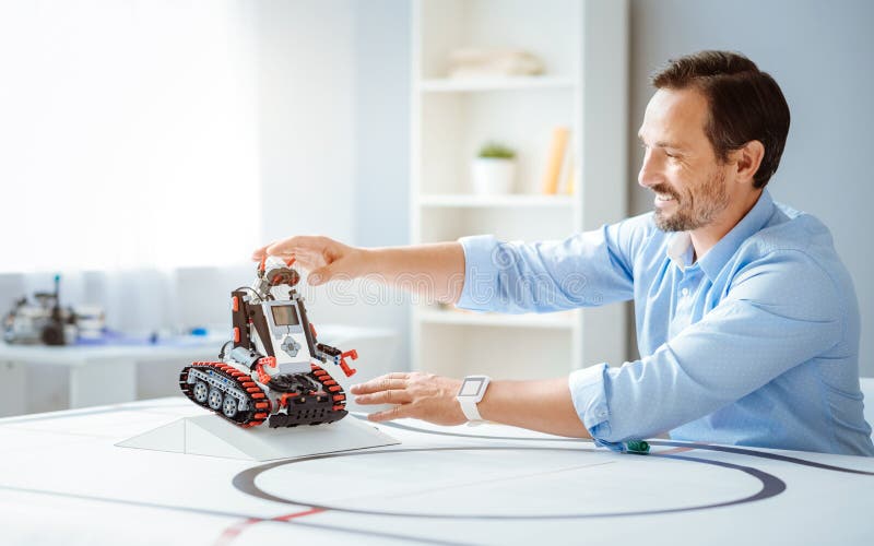 Positive Professional Engineer Testing Robot Stock Image - Image of ...