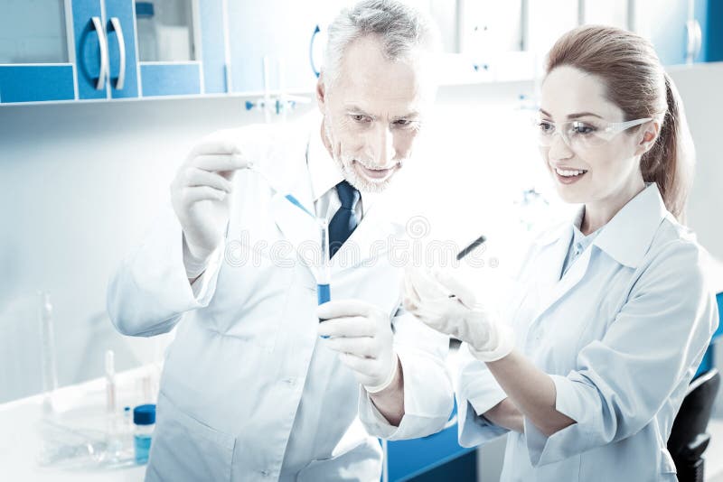 Positive Professional Scientists Working in the Lab Together Stock ... Positive Professional Scientists Working in the Lab Together Stock ...