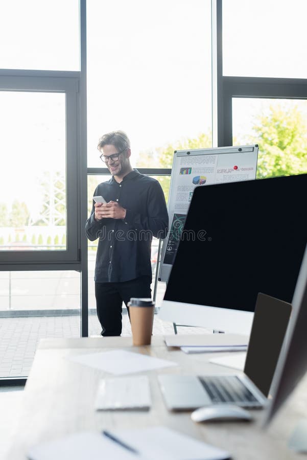 Positive Programmer Using Smartphone Near Flip Stock Image - Image of ...