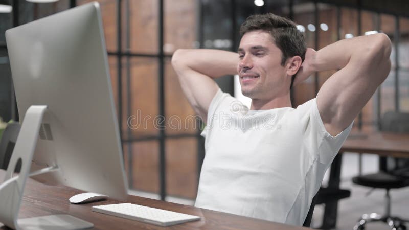Positive Relaxing Man Sitting at Work Stock Image - Image of internet ...