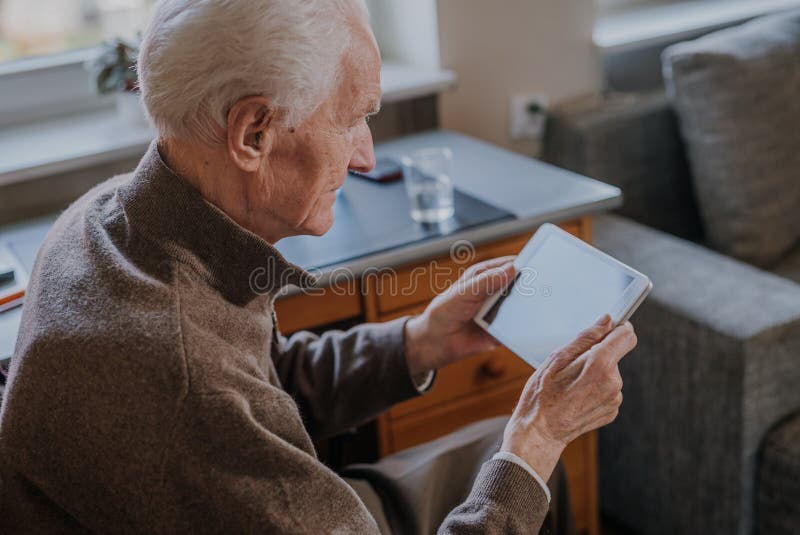 Positive Senior Using Digital Tablet Stock Image - Image of network ...