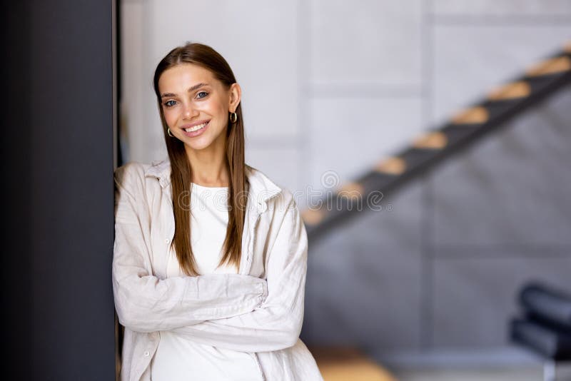 Positive Serious Woman Looking at Camera, Posing in Apartment Stock ...
