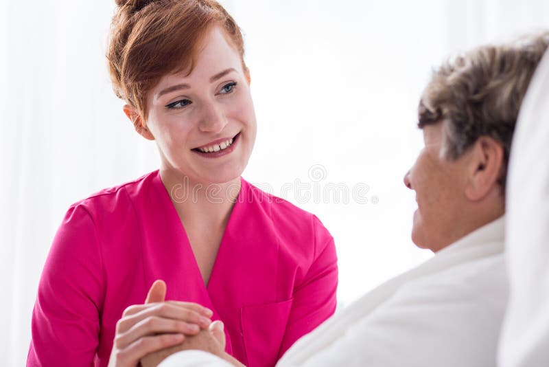 Positive smiling carer stock photo. Image of medicine - 61417370