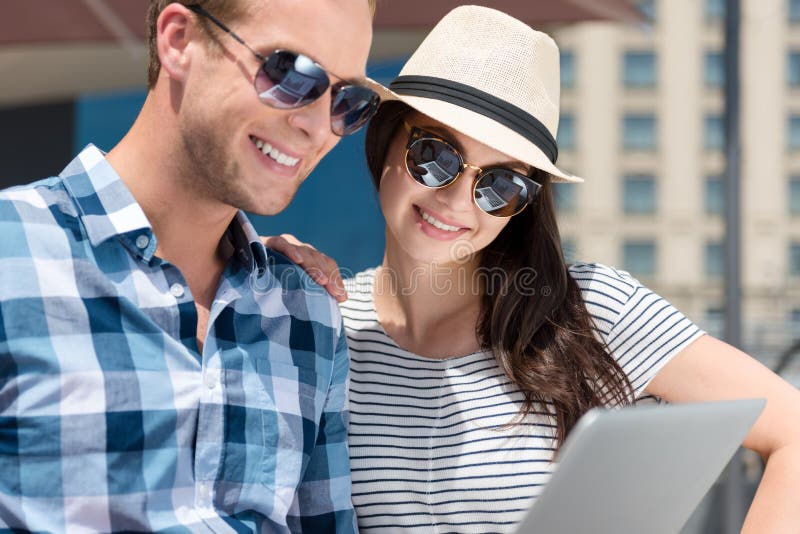 Positive Smiling Couple Sitting on the Bench Stock Photo - Image of ...