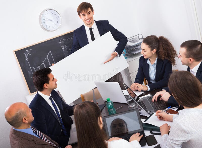 Positive Spirited Colleagues Discussing New Development Plan at Stock ...