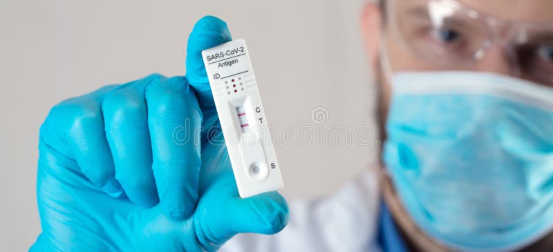 Positive Test Result by Using Rapid Test Device for COVID-19 Stock ...