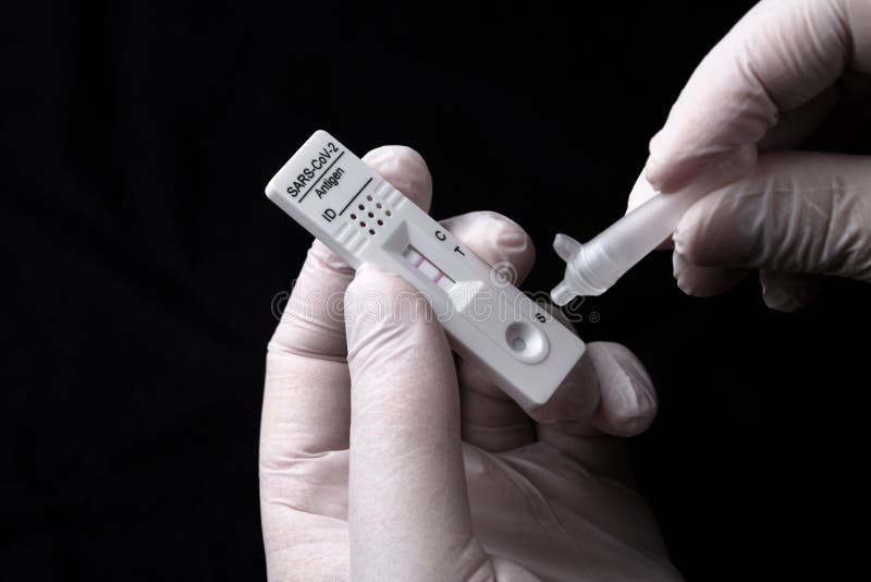 Positive Test Result by Using Rapid Test Device for COVID-19 Stock ...